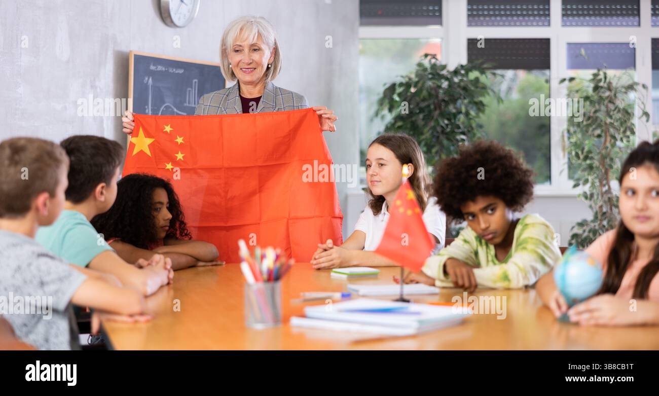 Mature woman teacher tells hi-res stock photography and images - Alamy