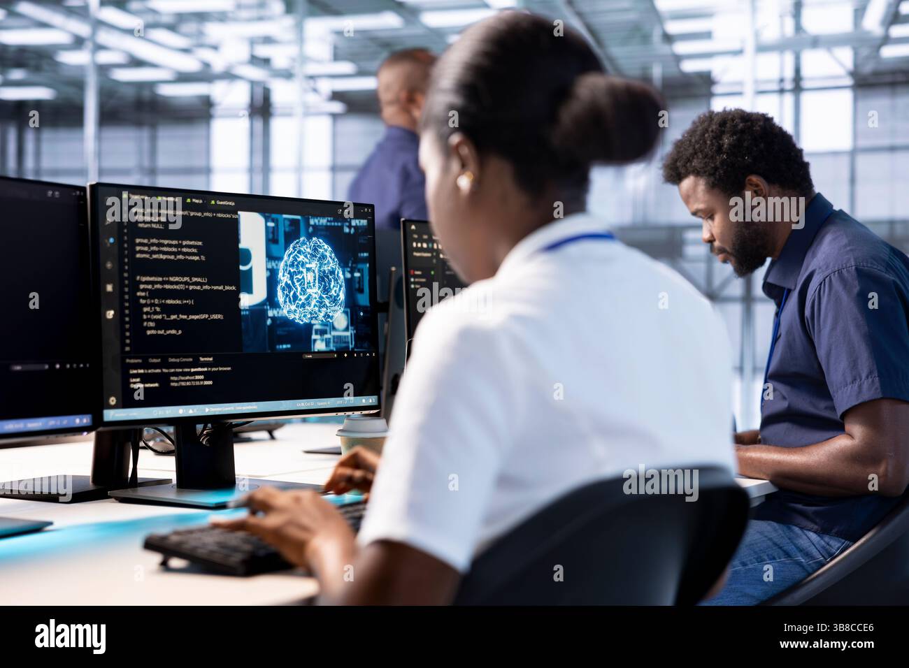 Server farm IT specialist doing AI research next to coworker, implementing algorithms using ...