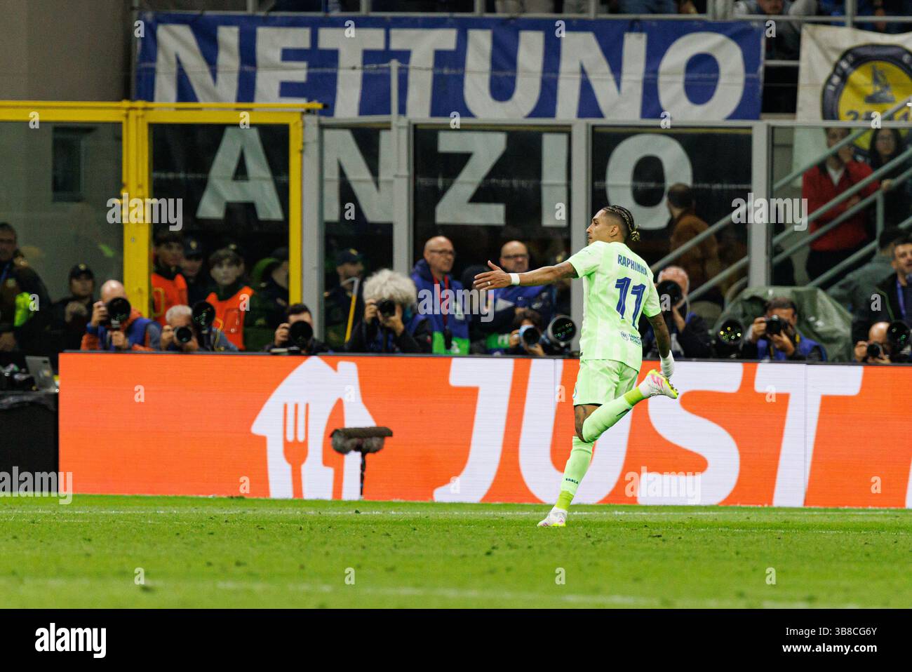 Raphinha seen celebrating after scoring goal during UEFA Champions ...