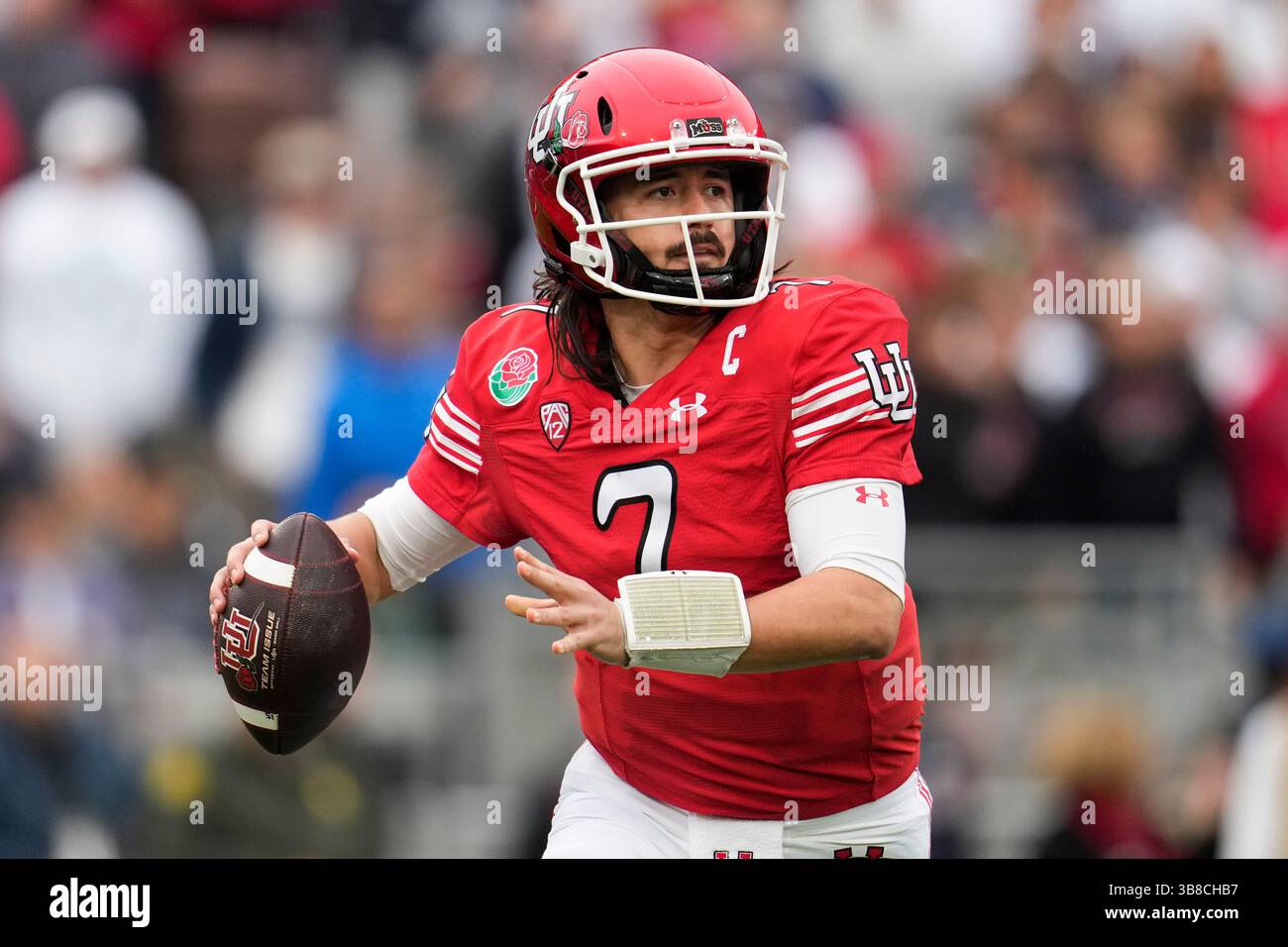 FILE -Utah quarterback Cameron Rising (7) looks to throw a pass during ...