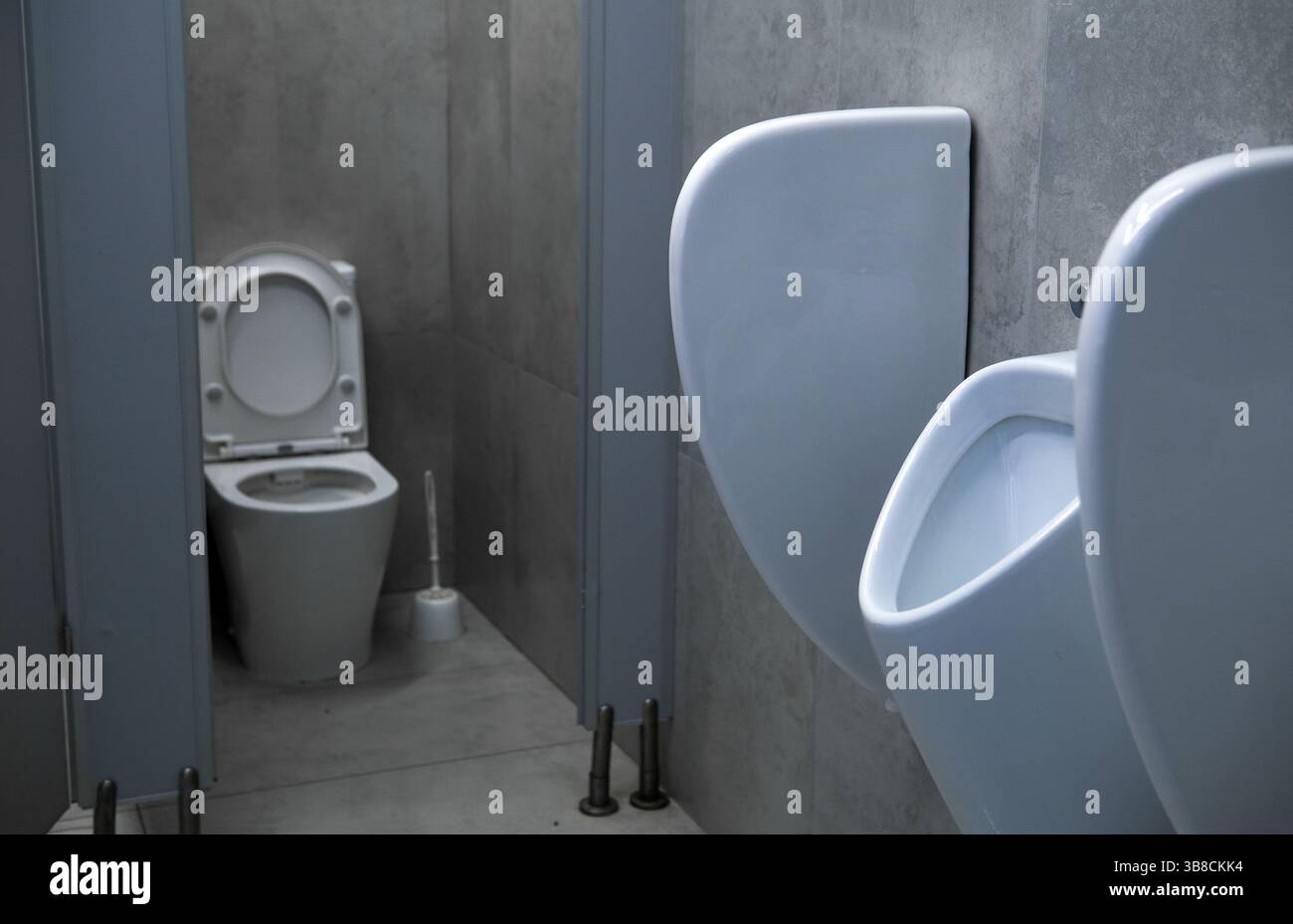 Modern public toilet interior with plumbing fixture. Nobody inside ...
