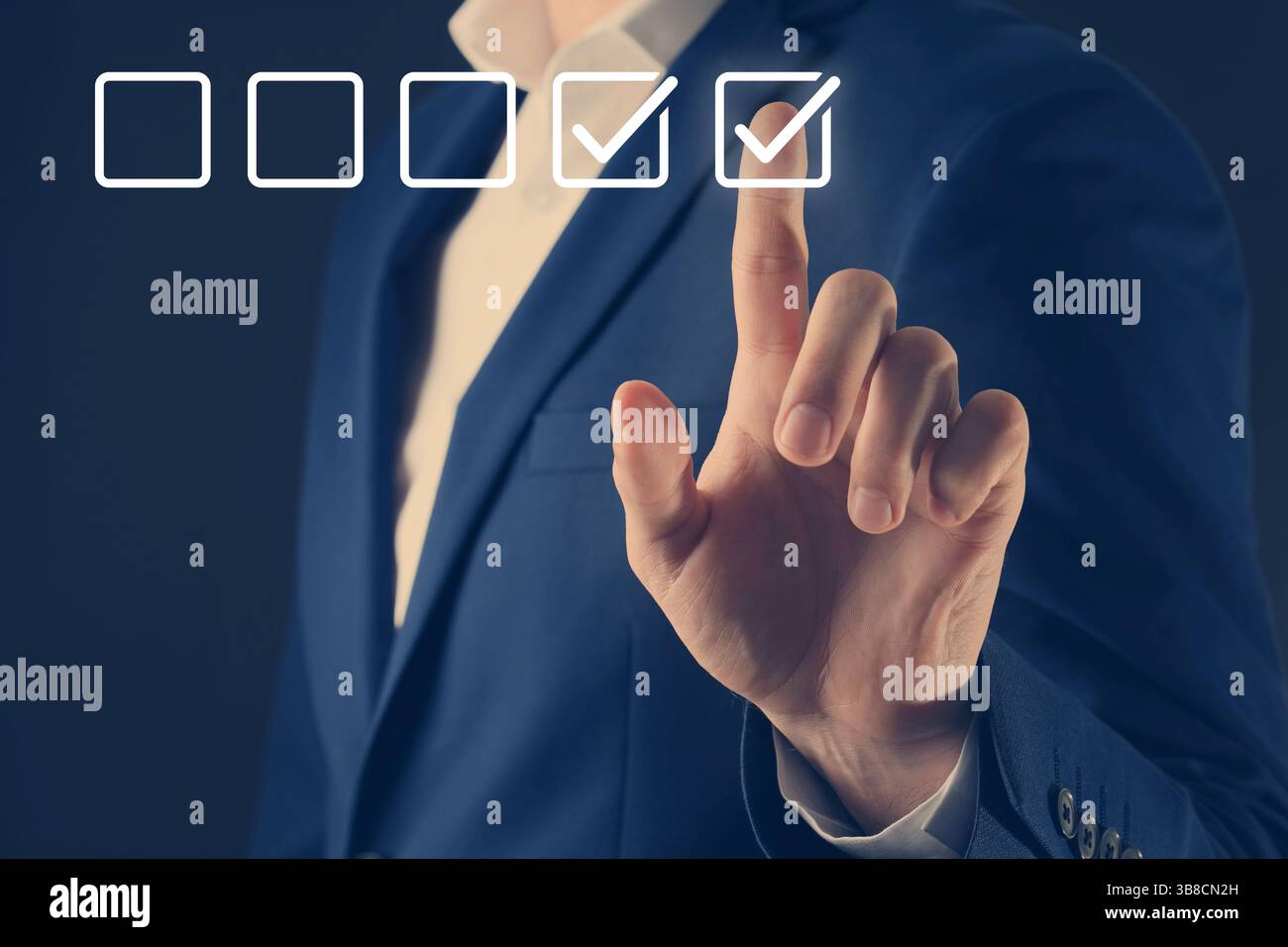 Approved. Man touching check mark on virtual screen against dark ...