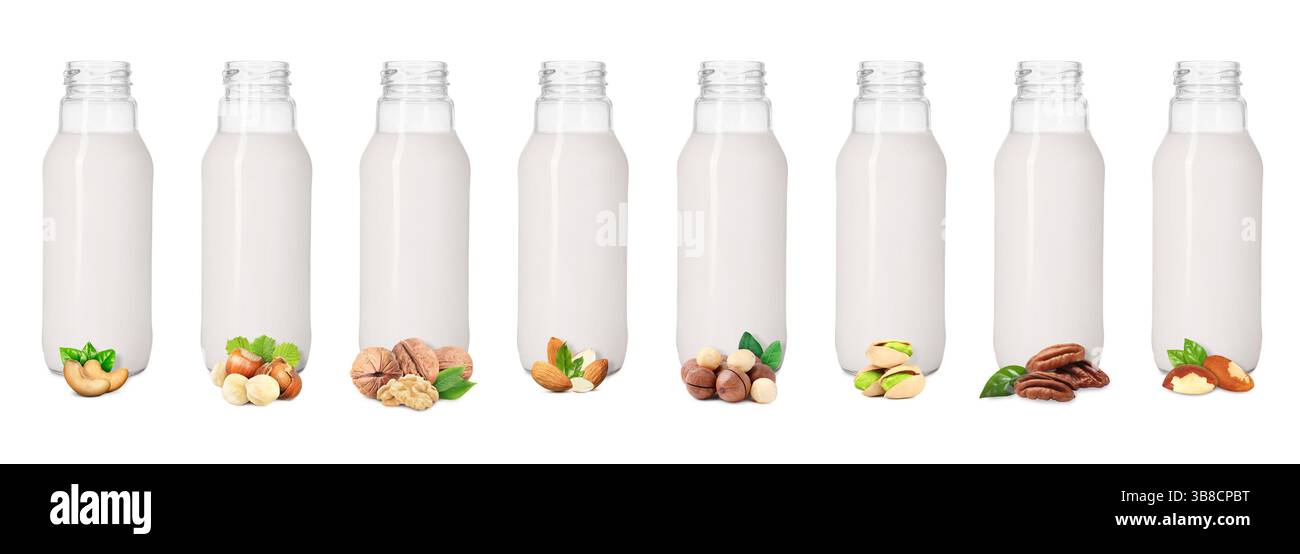 Different types of nut milk in glass bottles isolated on white, set ...