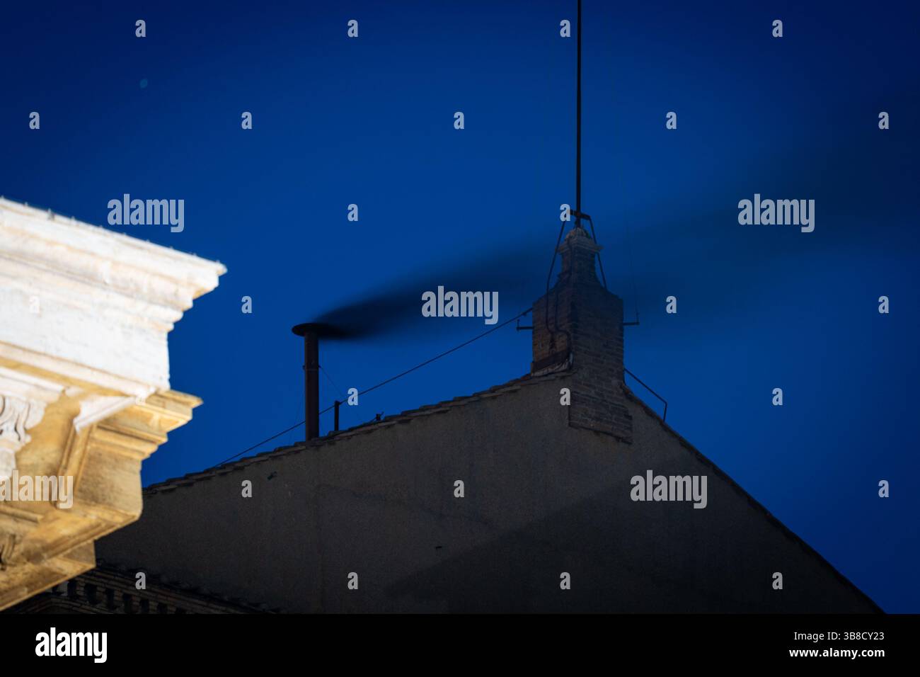 Vatican, Vatican. 07th May, 2025. Black smoke billows from the chimney ...