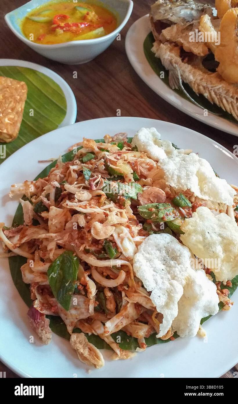 Indonesian Sundanese food - Lotek with emping crackers. Lotek is a ...