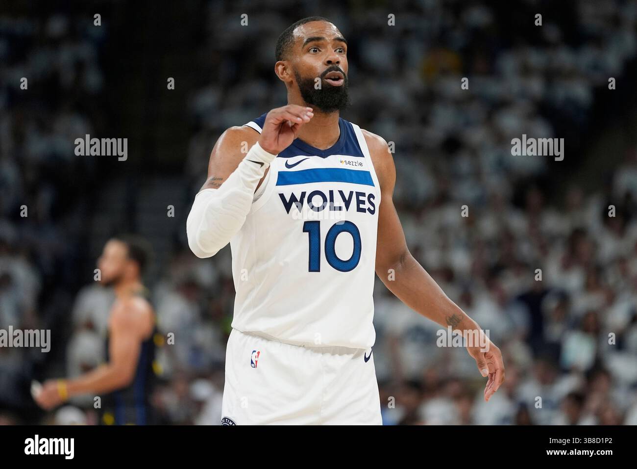 Minnesota Timberwolves guard Mike Conley (10) stands on the court ...