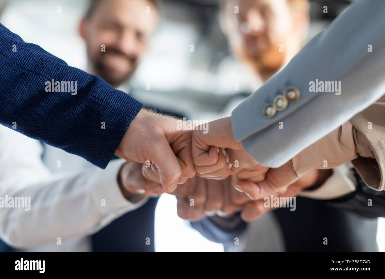 Hands bumping fists office hi-res stock photography and images - Alamy