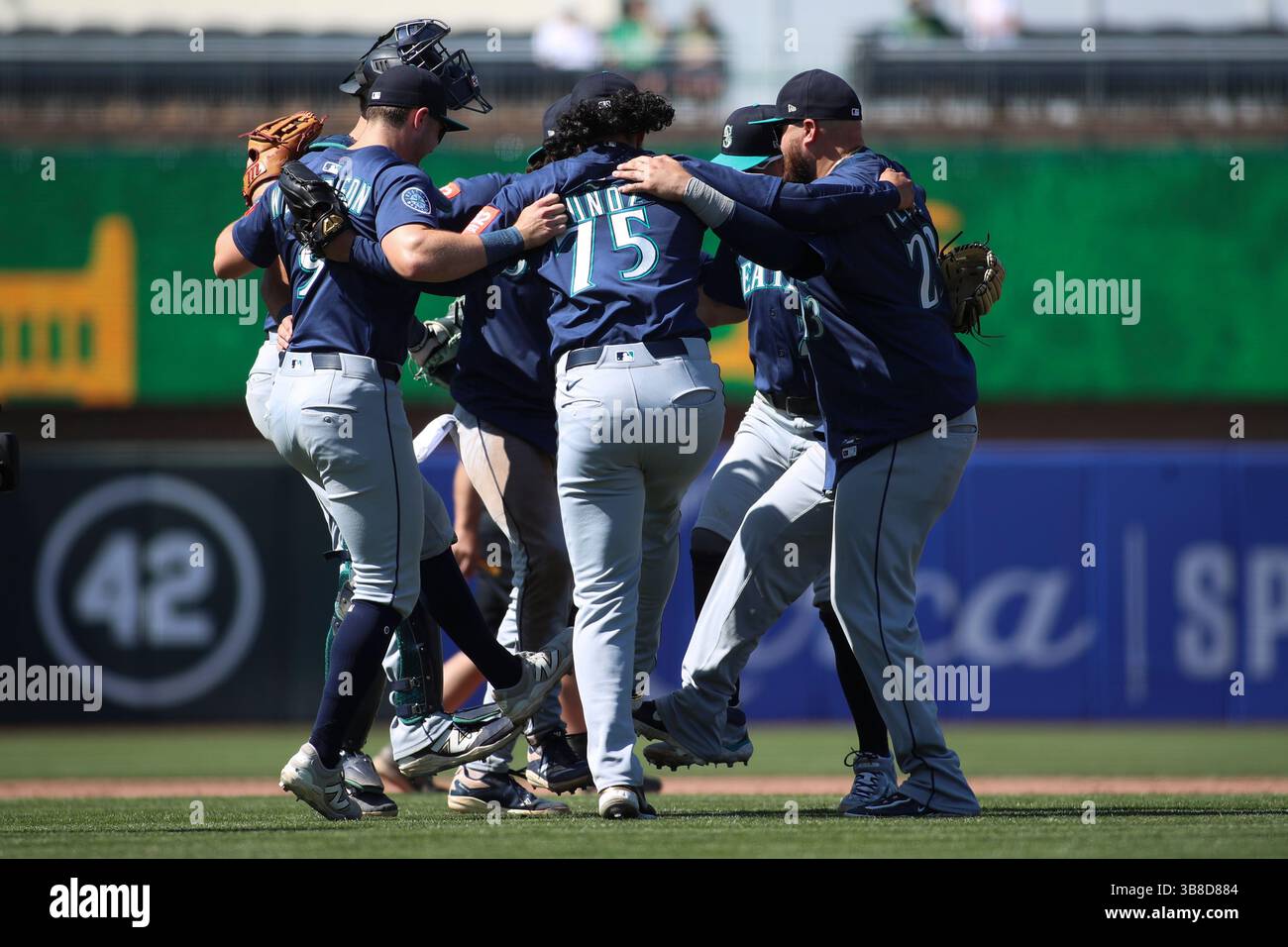 Seattle Mariners players celebrate their victory over the Athletics in ...