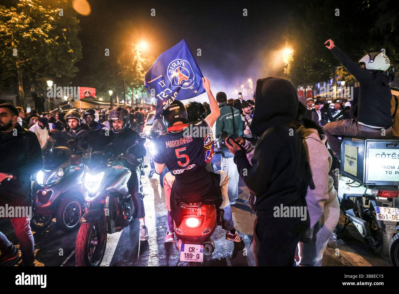 Paris Saint-Germain fans celebrate after the Champions League semifinal ...