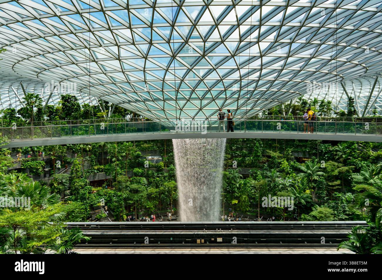 Singapore, 7 April 2025 : Parallax view of indoor Singapore rain vortex dome waterfall in rain ...
