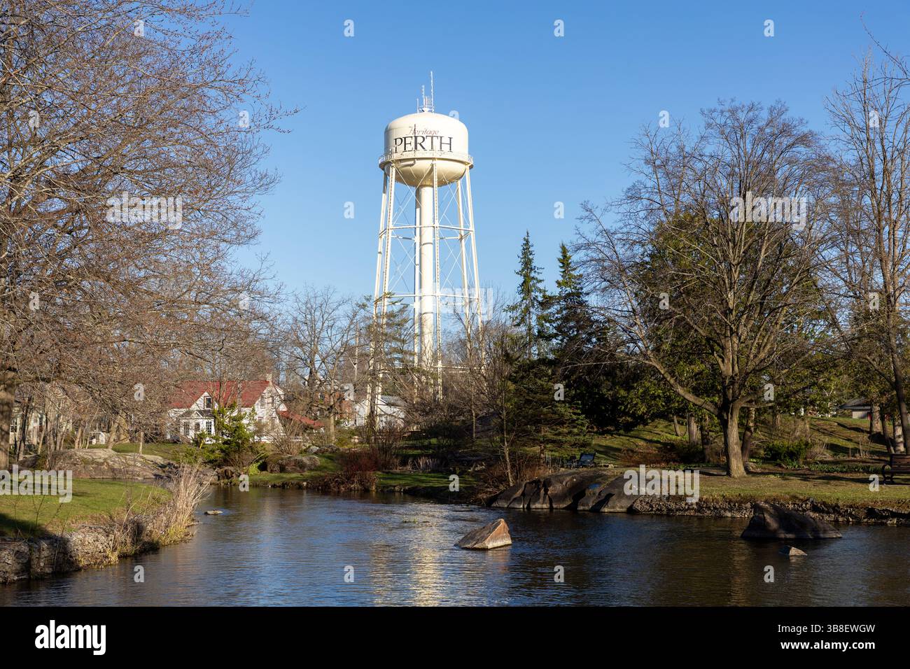 Perth, Canada -April 27, 2025: Park with creek and water tower in Perth ...