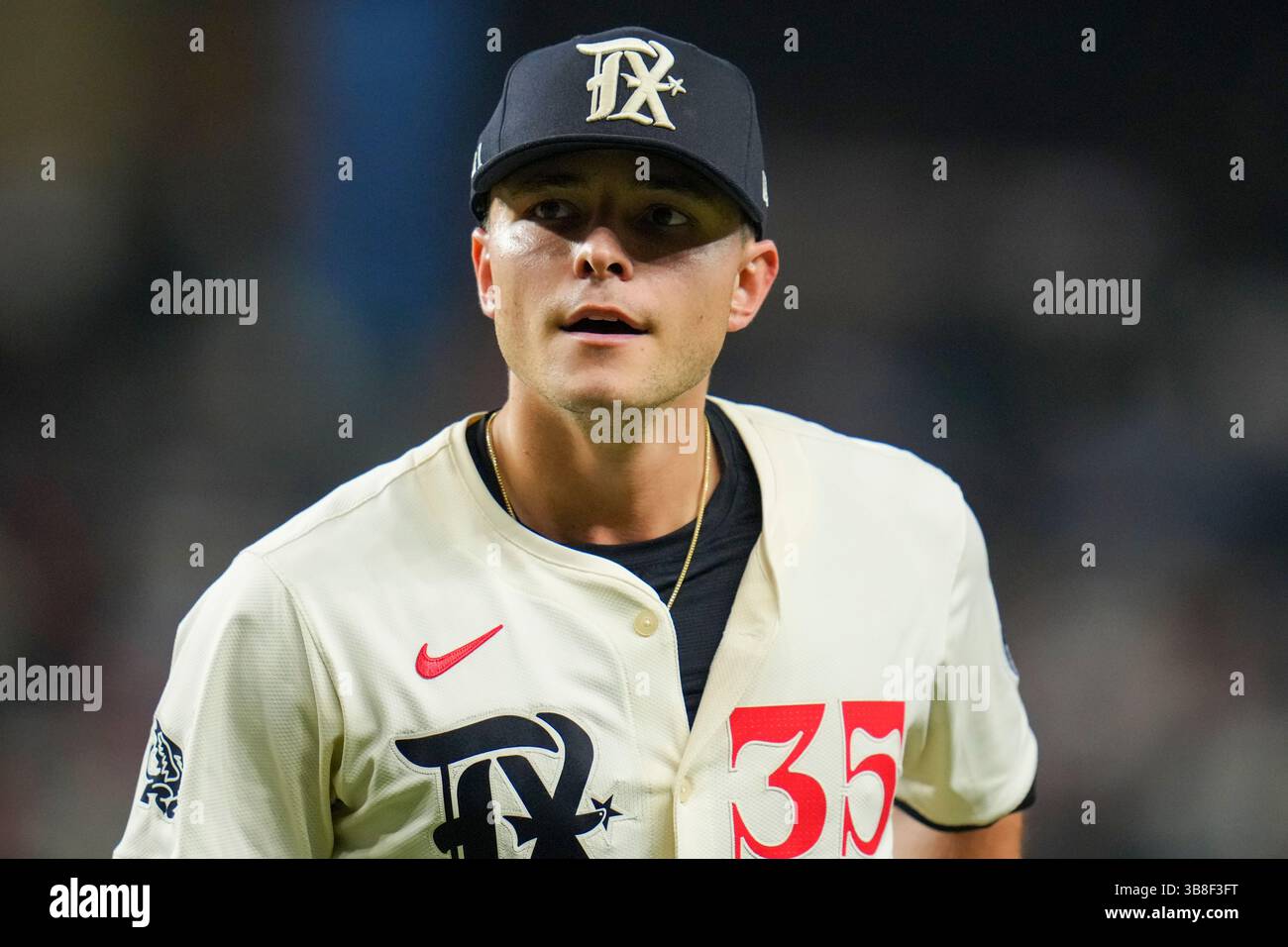 Texas Rangers starting pitcher Jack Leiter looks on after pitching to ...