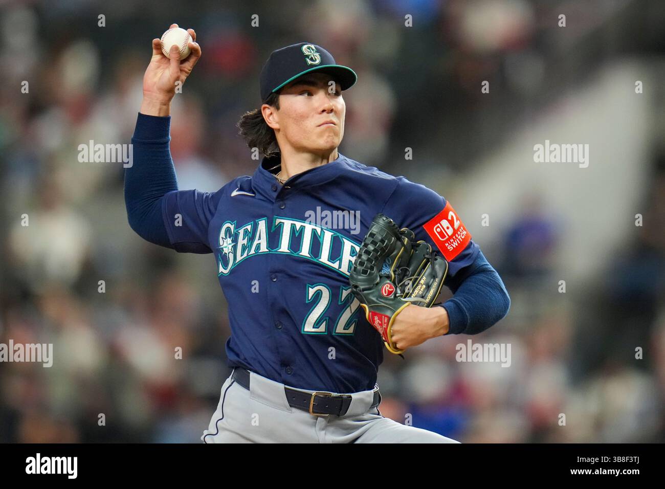Seattle Mariners starting pitcher Bryan Woo throws a pitch to the Texas ...