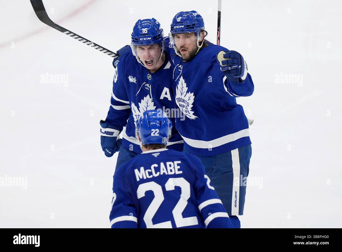 Toronto Maple Leafs' Mitch Marner (16) celebrates his goal with Chris ...