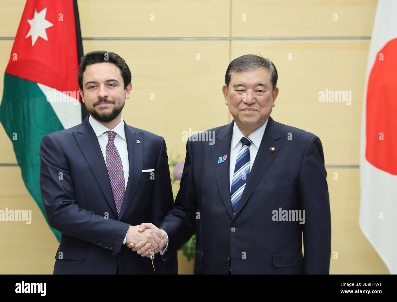 Jordanian Crown Prince Hussein bin Abdullah (L), the eldest son of King Abdullah II and Queen ...