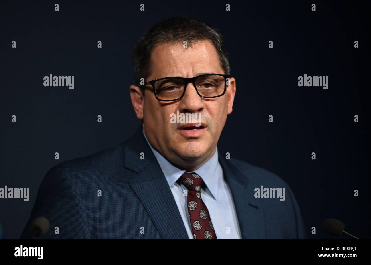 Detective Superintendent George Marchesini speaks to the media after a ...