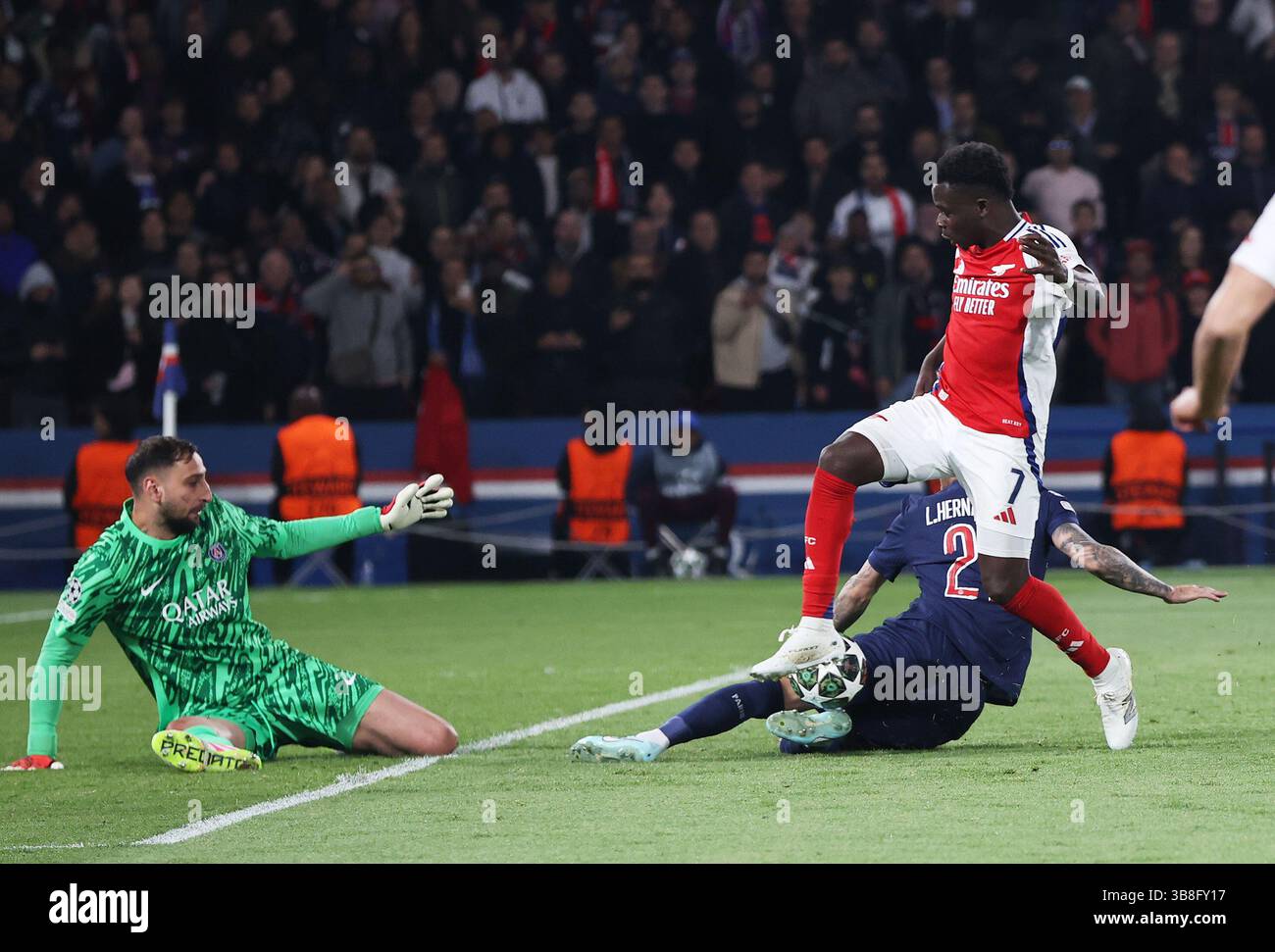 Paris, France. 7th May, 2025. Arsenal's Bukayo Saka (R) shoots during ...