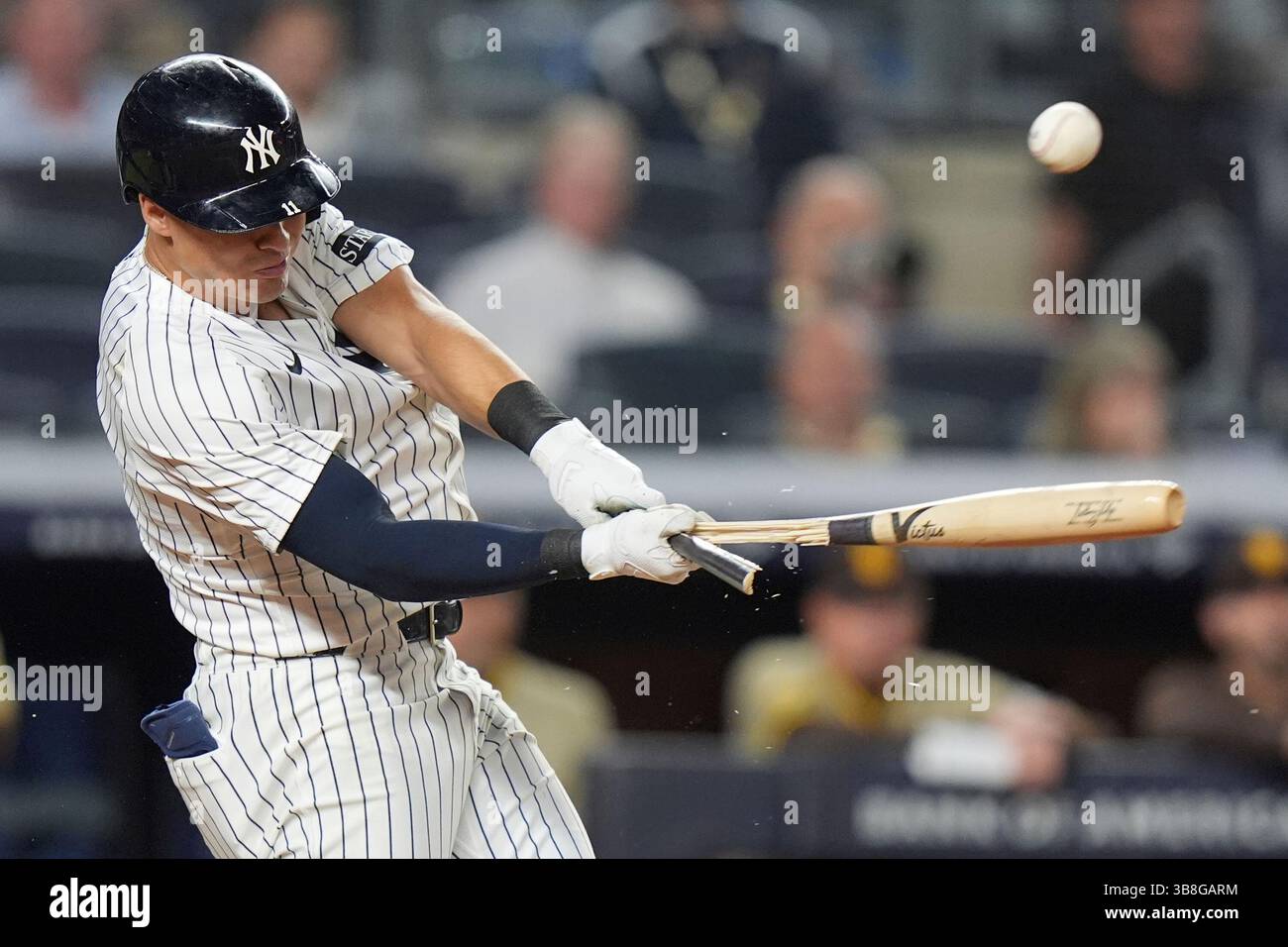 New York Yankees' Anthony Volpe breaks his bat while hitting a fly out ...
