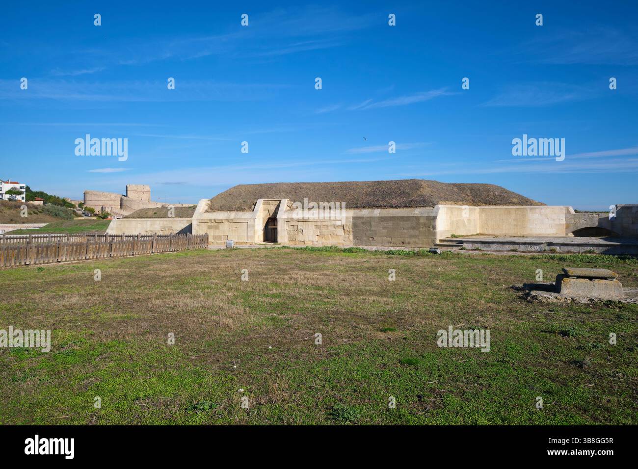 Exterior view of the berm design and fortifications of the complex. At ...