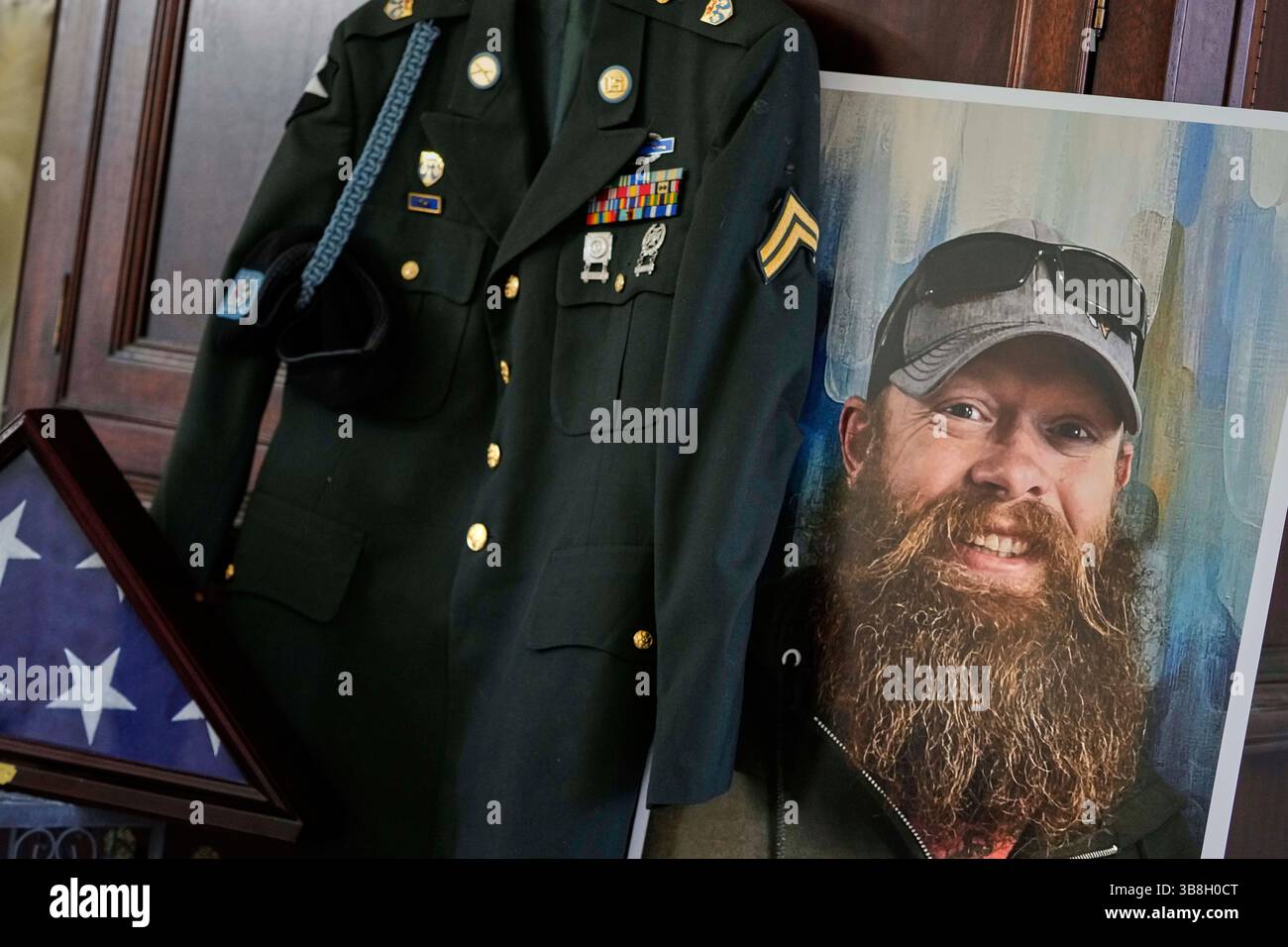 The Army dress uniform and photo of the late Christopher Pelkey is ...