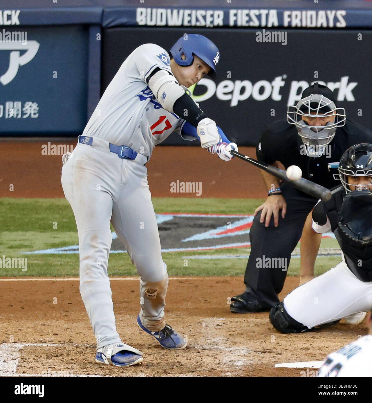 Los Angeles Dodgers designated hitter Shohei Ohtani hits a triple in ...