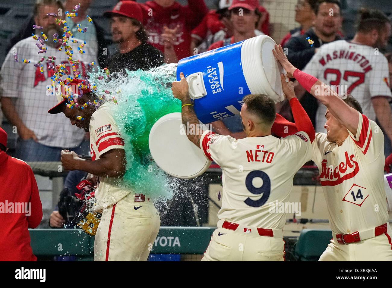 Los Angeles Angels' Jorge Soler, left, has liquid pure on him by Zach ...