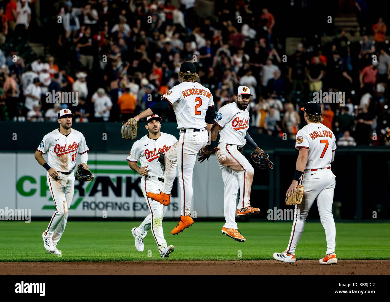 Baltimore Orioles shortstop Gunnar Henderson (middle left) and center ...