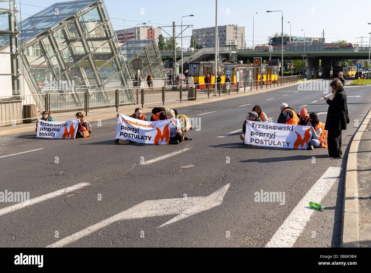 Traffic is stopped by the climate activists blocking the road. On May 6 ...