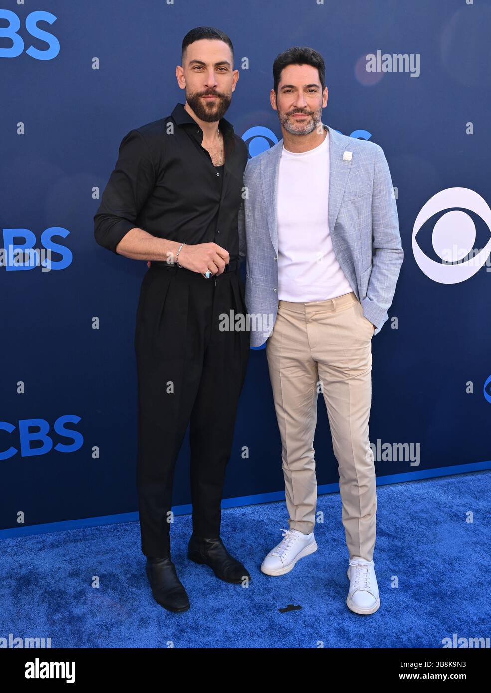 Hollywood, USA. 07th May, 2025. Zeeko Zaki and Tom Ellis arriving at ...