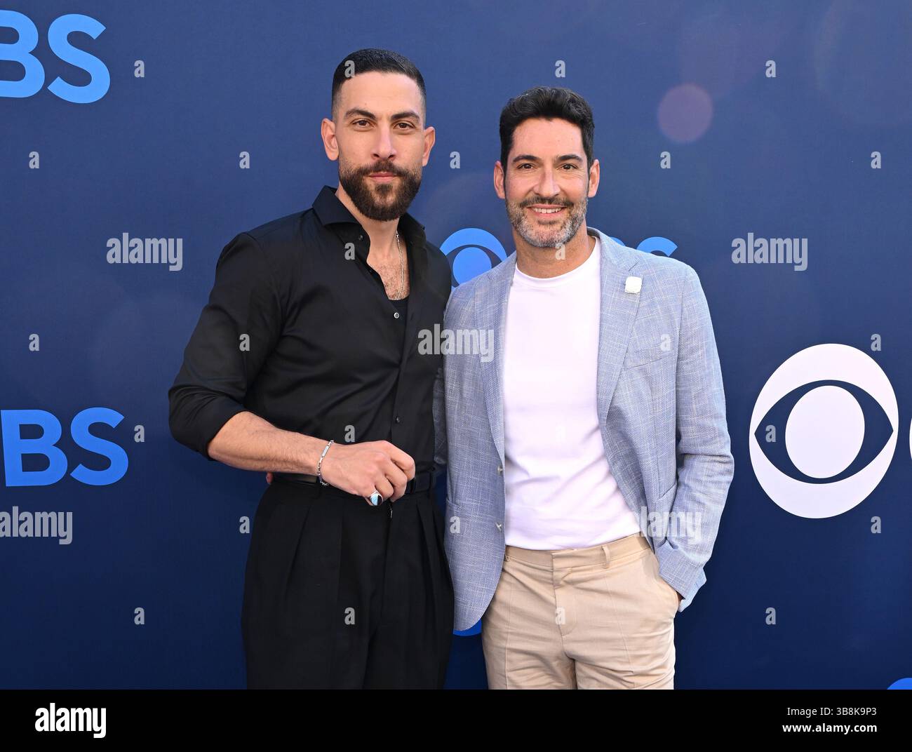 Hollywood, USA. 07th May, 2025. Zeeko Zaki and Tom Ellis arriving at ...
