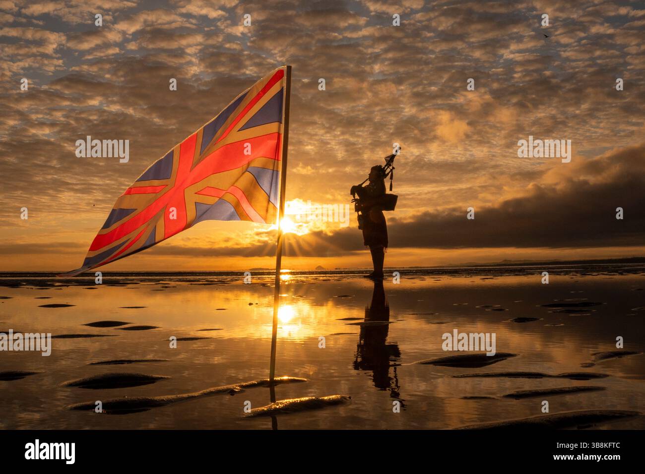 Scotland's National Piper Louise Marshall playing a lament to the ...
