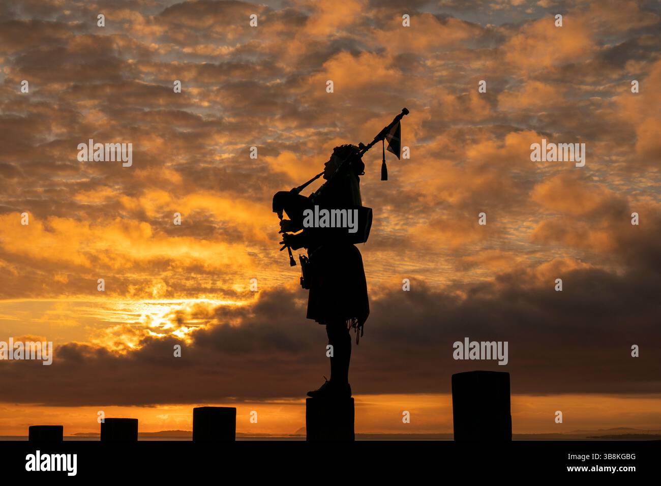 Scotland's National Piper Louise Marshall playing a lament to the ...