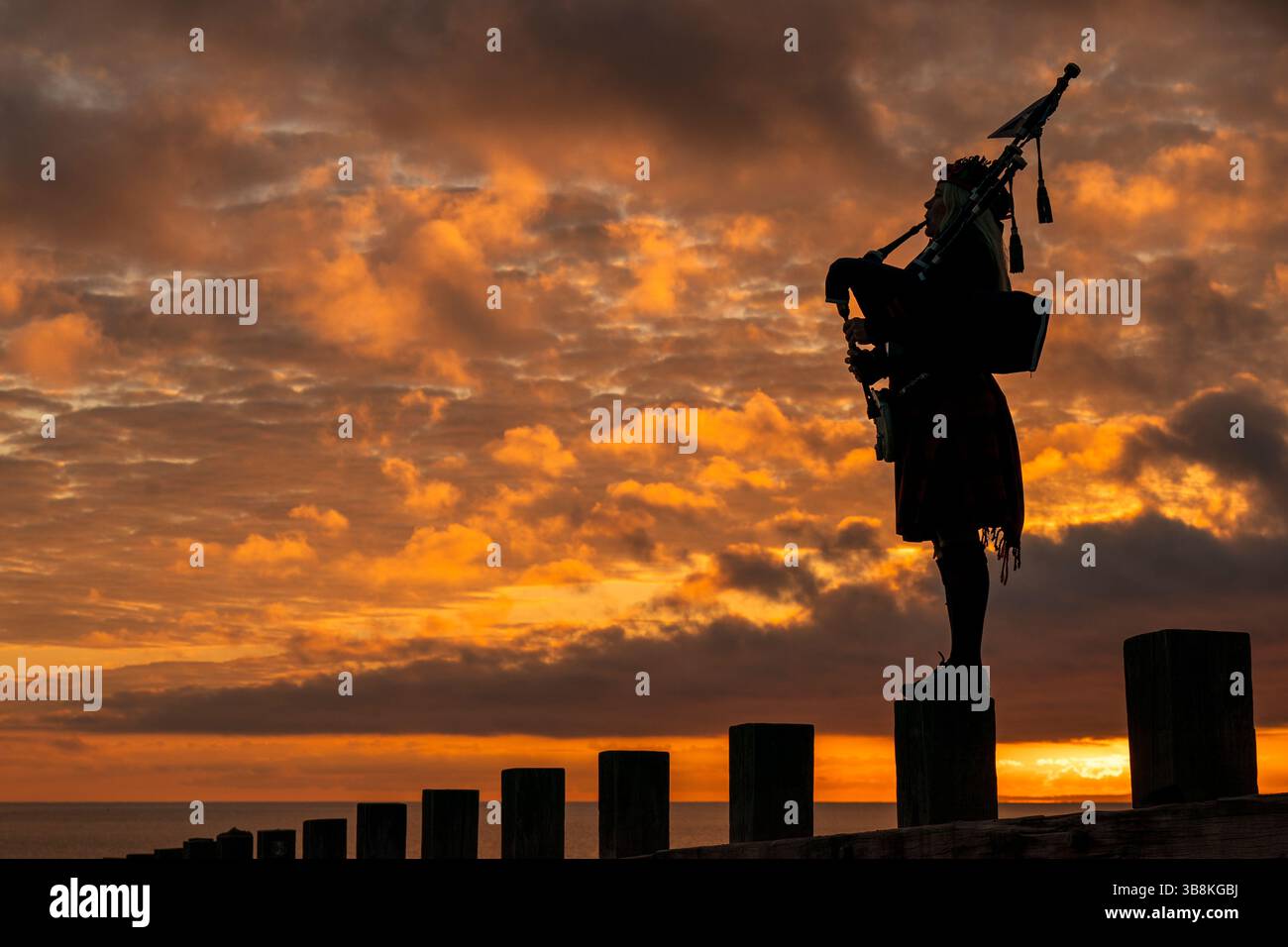 Scotland's National Piper Louise Marshall playing a lament to the ...