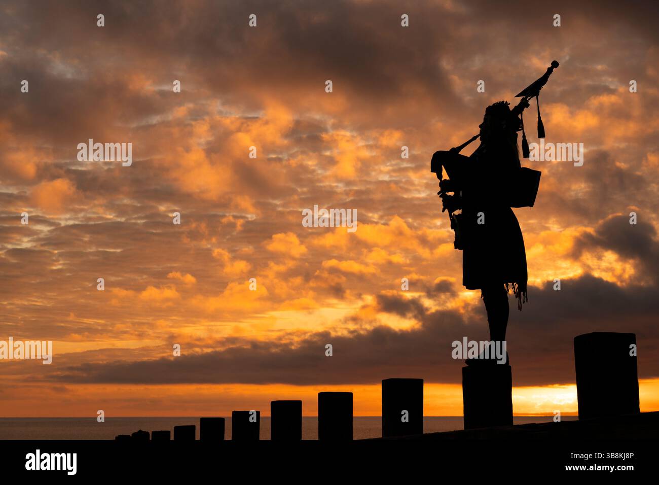 Scotland's National Piper Louise Marshall playing a lament to the ...