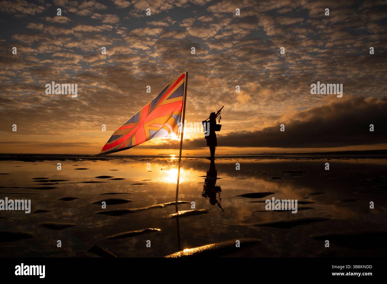 Scotland's National Piper Louise Marshall playing a lament to the ...