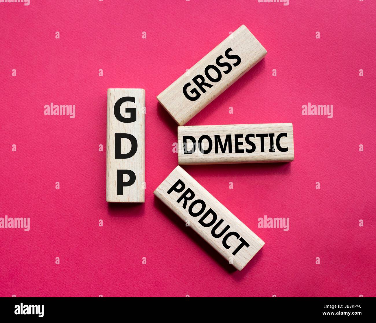 GDP - Gross domestic product symbol. Concept word GDP on wooden cubes ...