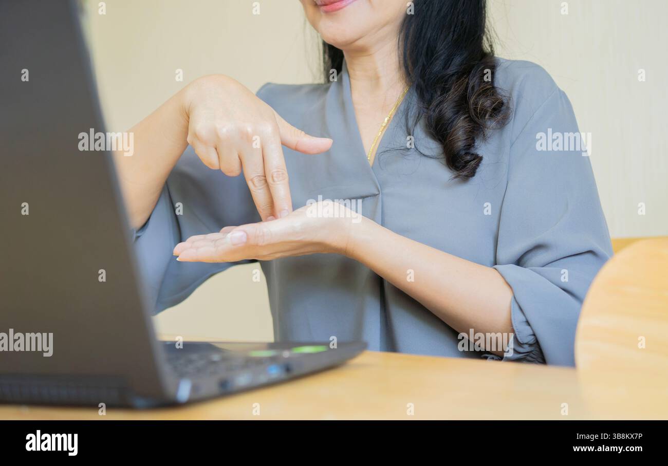 Asian woman teach learner via video call on laptop sit at desk show ...