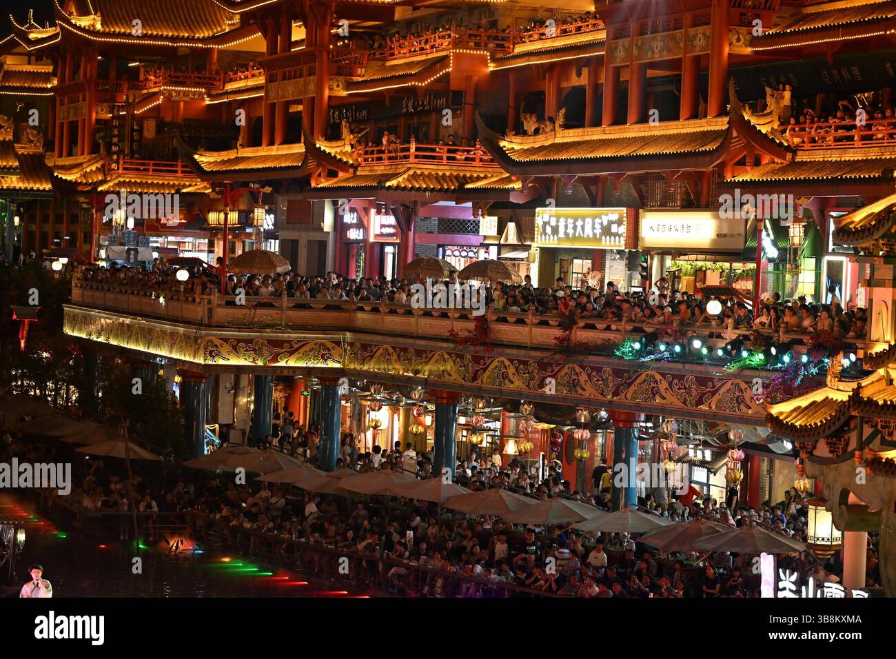 Tourists visit a scenic area during May Day holidays in Meishan City ...