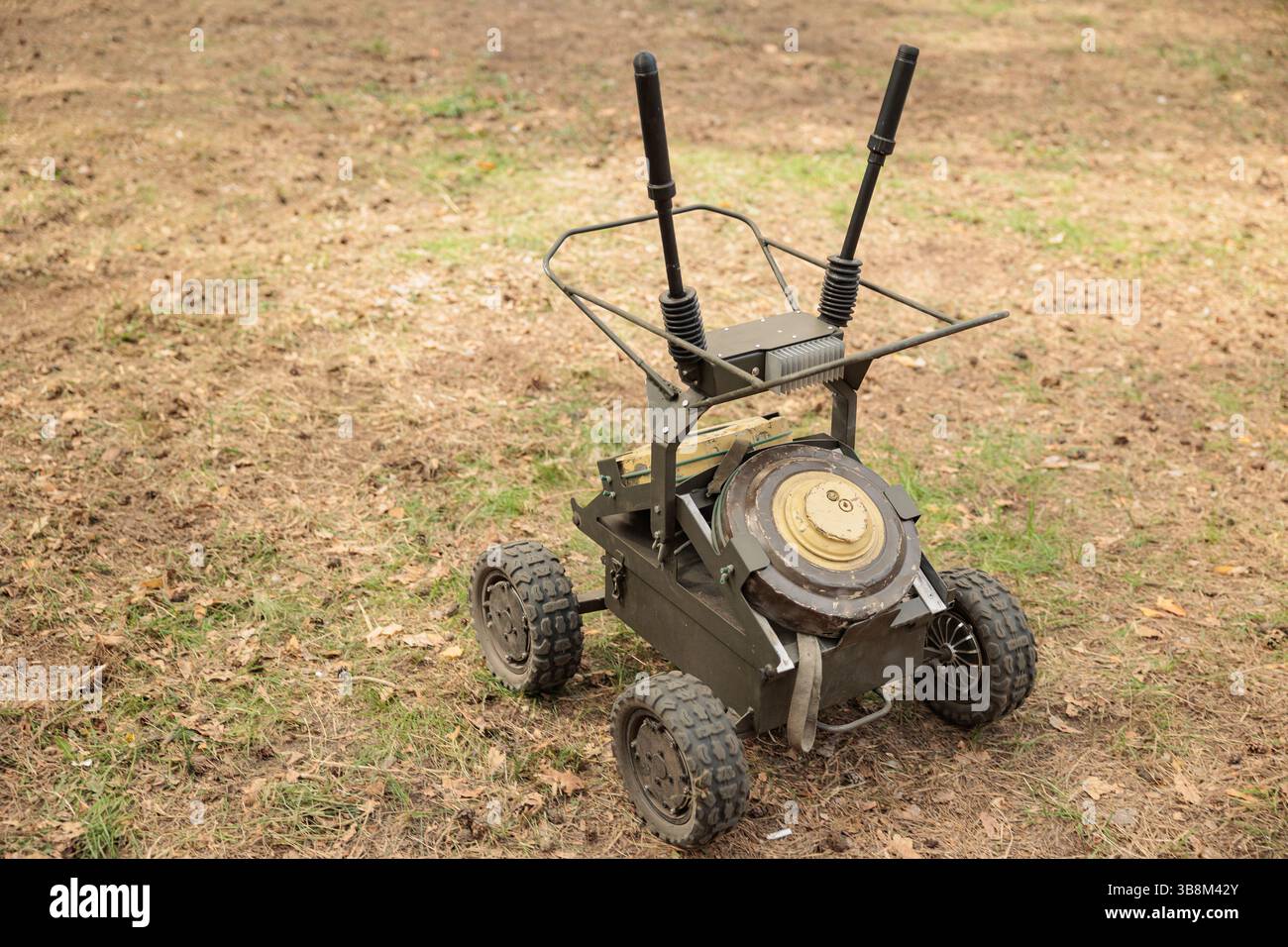 Armed military ground drone in firing field Stock Photo - Alamy