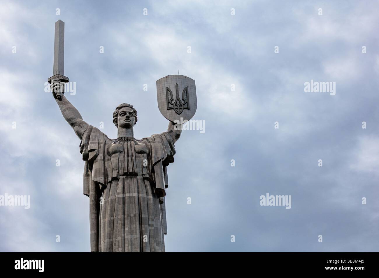 The Coat of Arms of Ukraine on the shield of the Motherland Monument is ...