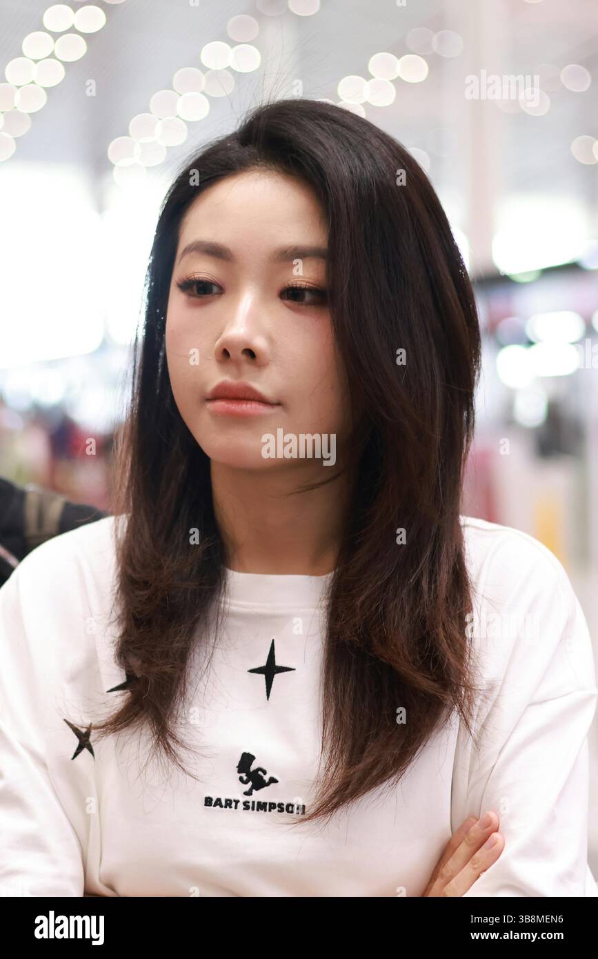 Chinese singer and actress Yu Yan appears at the airport in Beijing ...