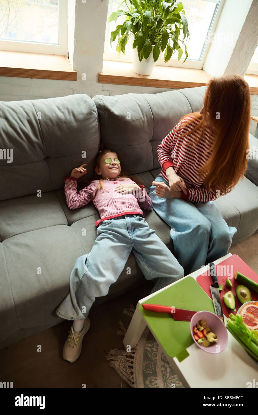 Mother daughter relaxing cucumber hi-res stock photography and images ...