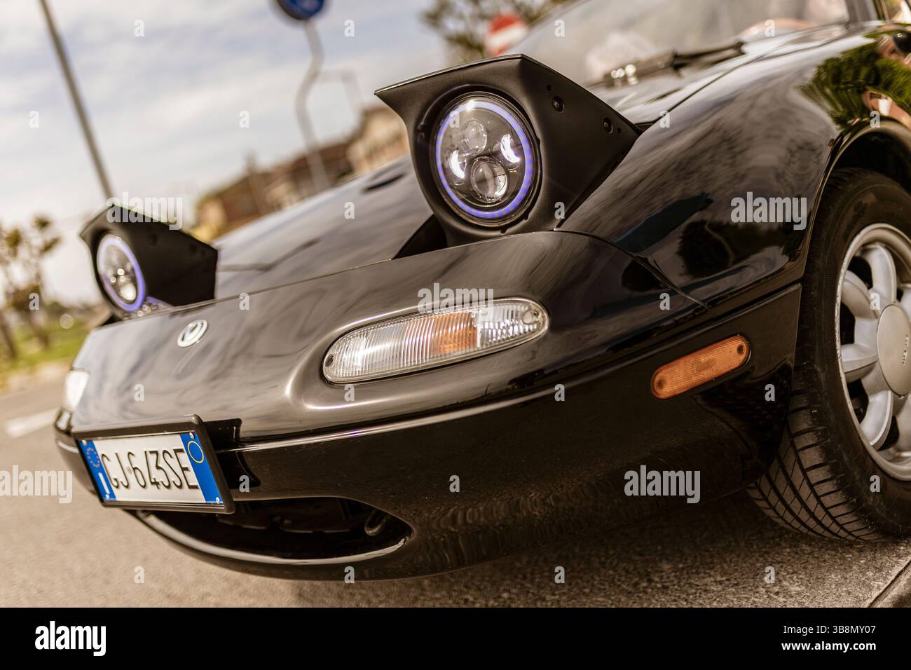 Rome, italy 4 may 2025: close-up of customized angel eyes headlights on ...