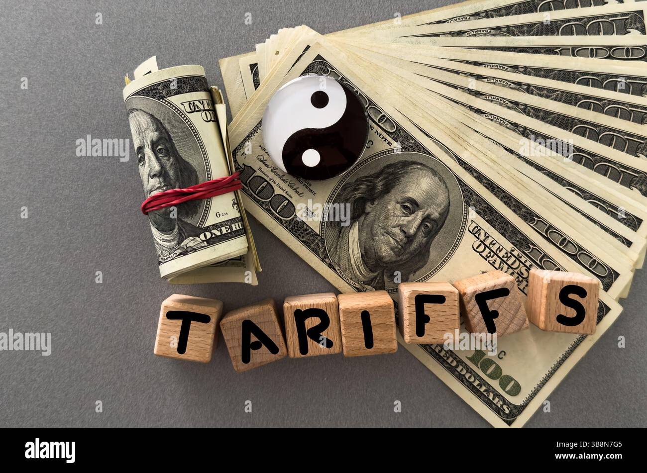tariffs on a background of dollars with a balance symbol. High quality ...