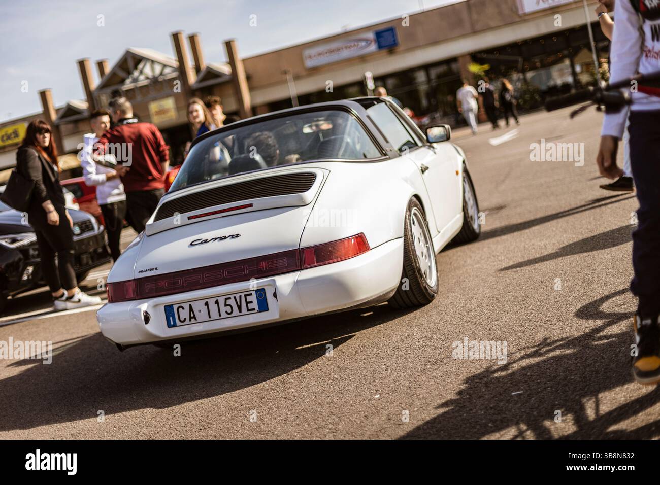 Rome, italy 4 may 2025: white porsche carrera cabriolet parked in a ...