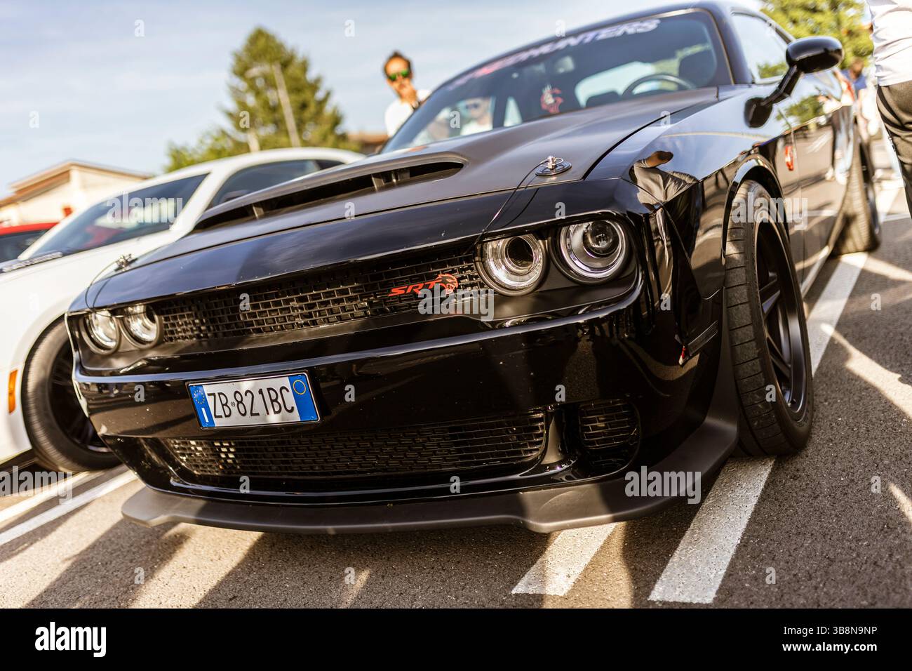 Rome, italy 4 may 2025: low angle view of a tuned black dodge ...