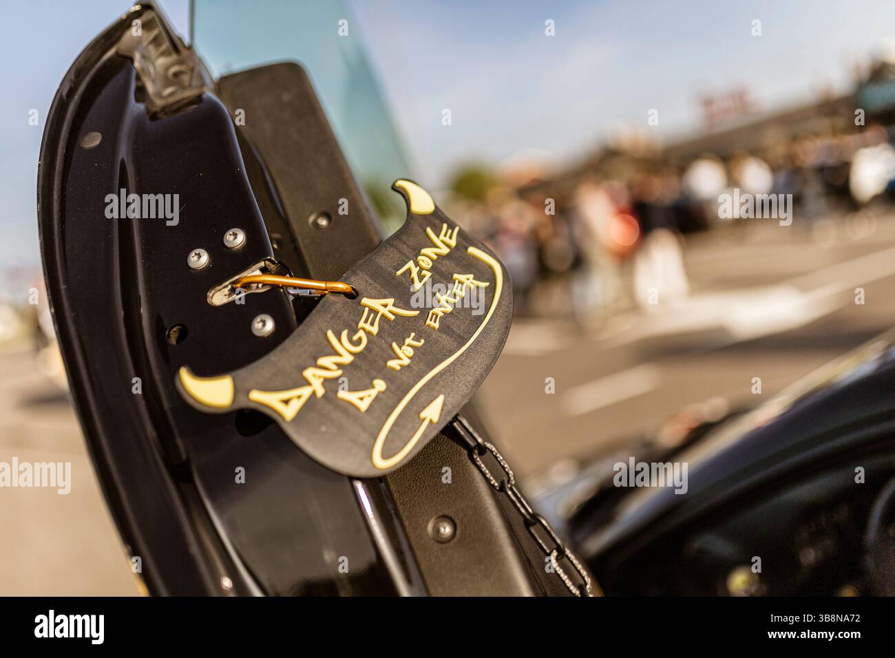 Rome, italy 4 may 2025: black and gold danger zone sign hanging from ...