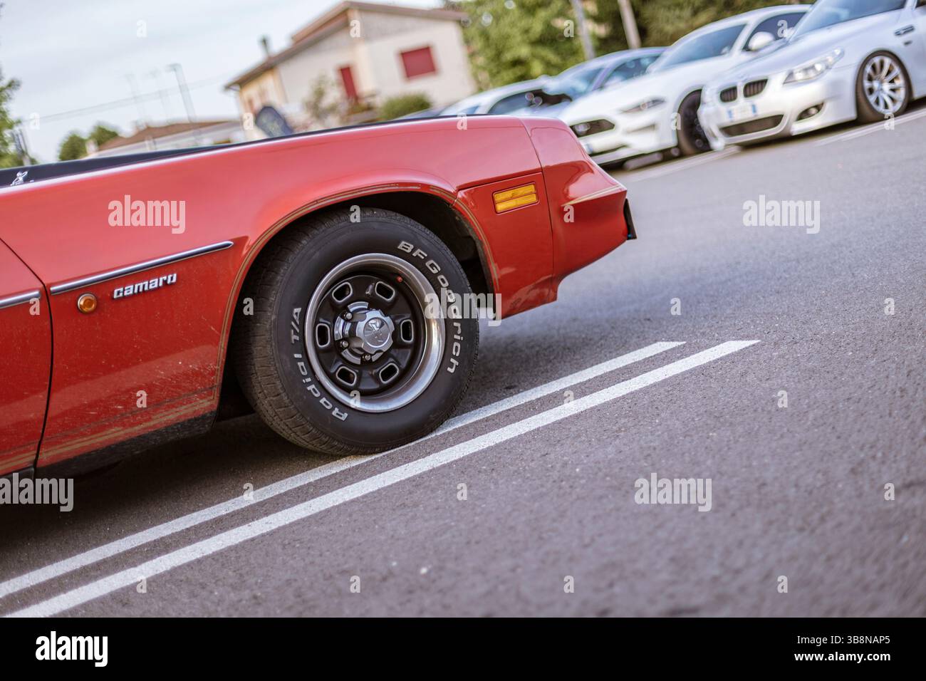 Rome, italy 4 may 2025: close-up of a red chevrolet camaro parked in a ...