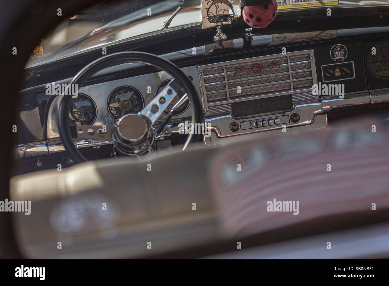 Rome, italy 4 may 2025: reflecting vintage plymouth cranbrook dashboard ...