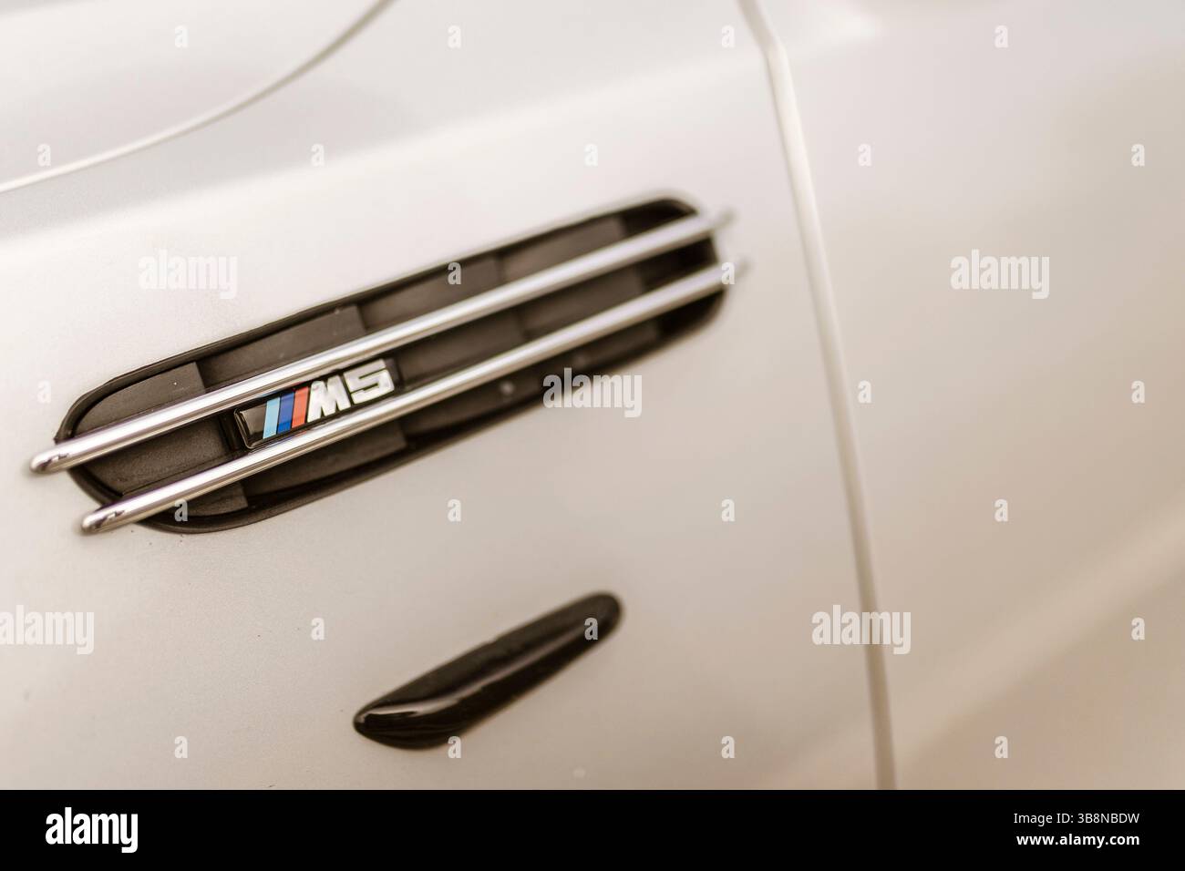 Rome, italy 4 may 2025: close-up of the iconic m5 logo on a bmw ...